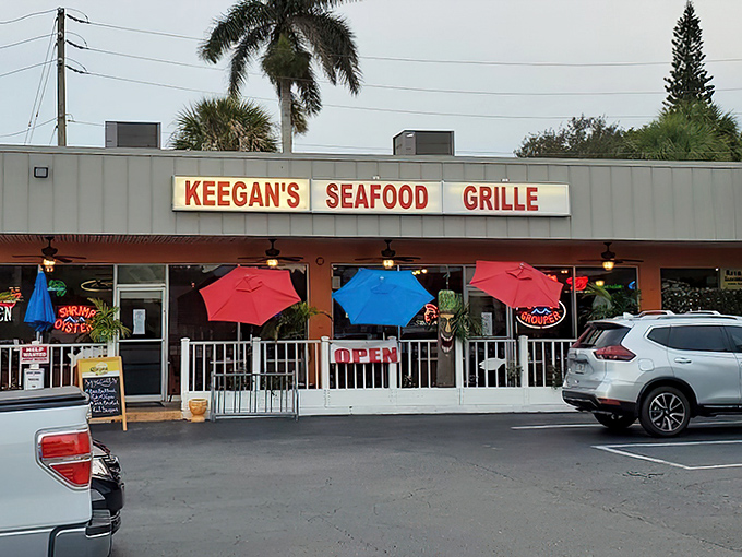 The neon glow of Keegan's sign acts like a lighthouse for hungry souls, beckoning seafood lovers to this Indian Rocks Beach treasure after sunset. 