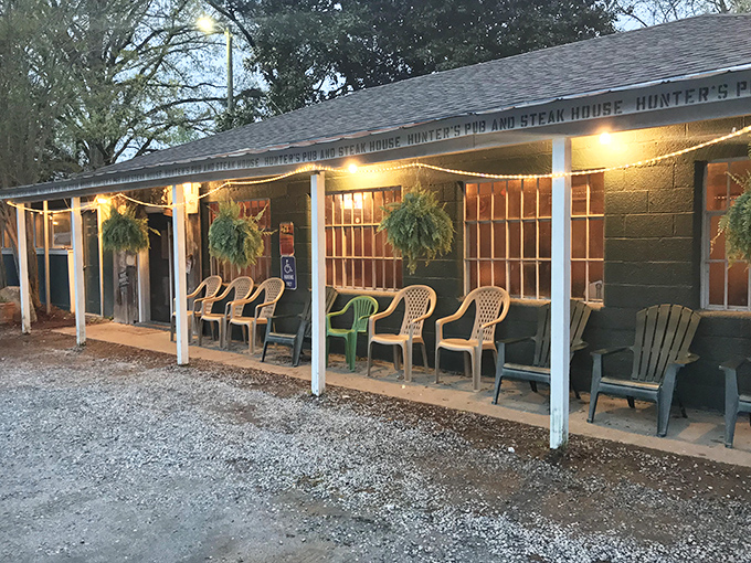 This unassuming exterior hides culinary treasures that would make city steakhouses nervous about their reputation.