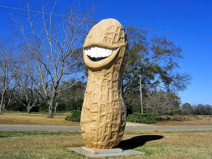 The world's most cheerful legume stands proudly against the Georgia sky, greeting visitors with a smile that could brighten even the cloudiest day.