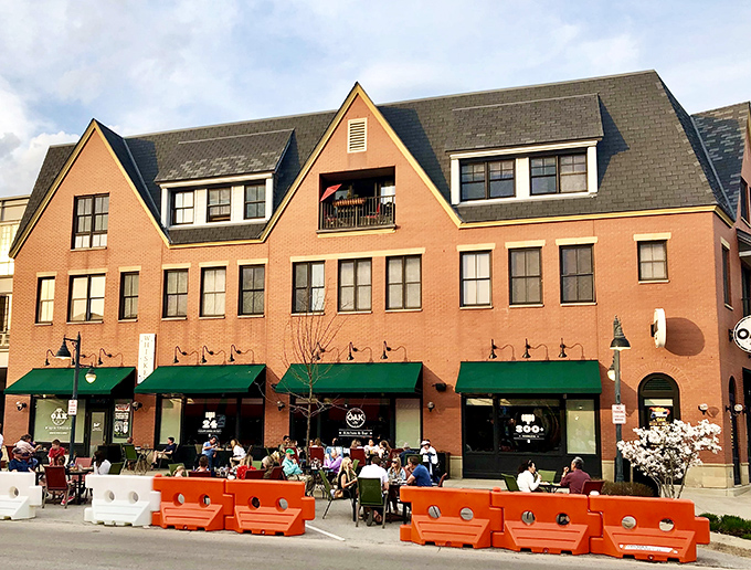 The iconic Oak sign beckons from the warm brick facade, promising culinary adventures that have burger enthusiasts making pilgrimages from across Illinois.