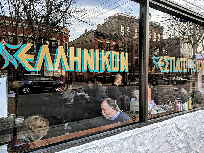 The unassuming white facade of Athenian Room hides culinary treasures within. Like finding a Greek island oasis in Lincoln Park's urban landscape.