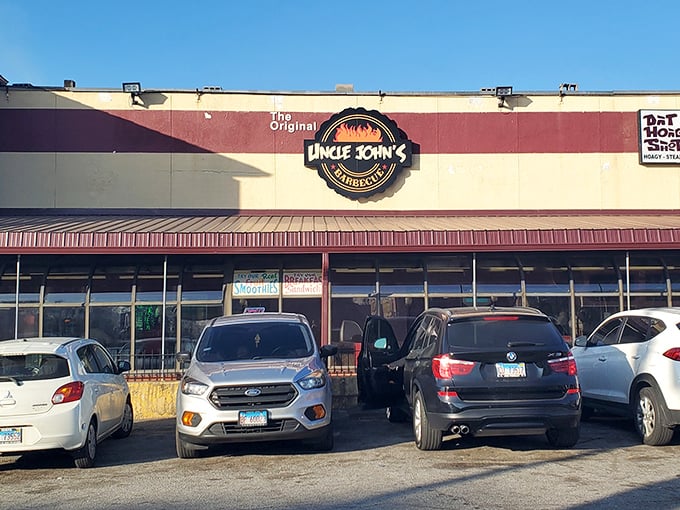 The unassuming storefront of Uncle John's BBQ stands like a beacon for smoke-seekers, its modest exterior hiding Chicago's barbecue royalty within.