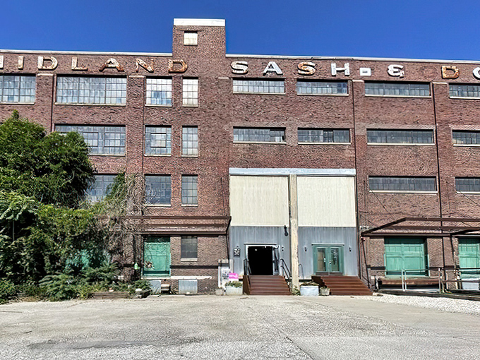 The imposing brick facade of Midland Arts & Antiques Market stands as a testament to Indianapolis industrial history, now housing treasures instead of window frames.