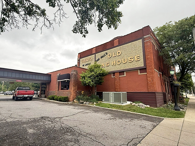 The iconic brick fa&ccedil;ade of the Old Gas House stands proudly in Fort Wayne, its golden lettering promising culinary adventures within.