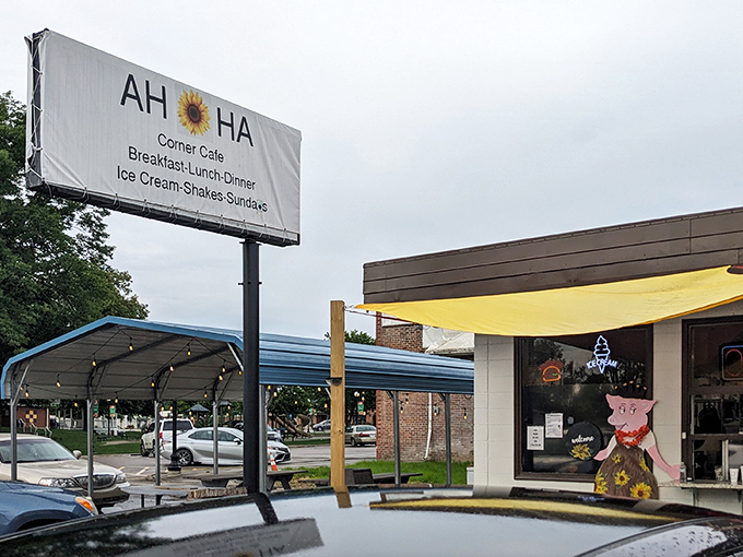 The unassuming exterior of AH-HA Corner Cafe might not scream "culinary destination," but that sunflower hints at the warmth waiting inside.