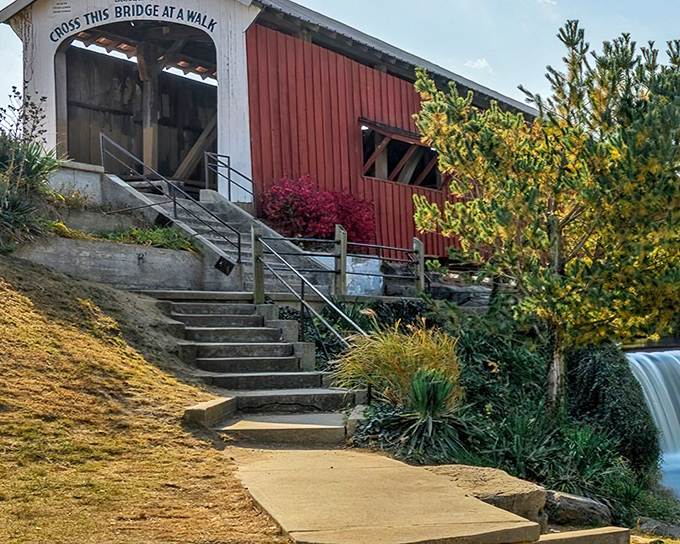 The iconic white and red Bridgeton Bridge welcomes visitors with its charming "Cross This Bridge At A Walk" instruction&mdash;advice worth heeding to savor every historic step. 