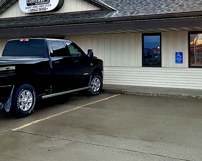 The unassuming exterior of Chuckwagon Restaurant in Adair proves once again that culinary treasures often hide in plain sight along America's highways.