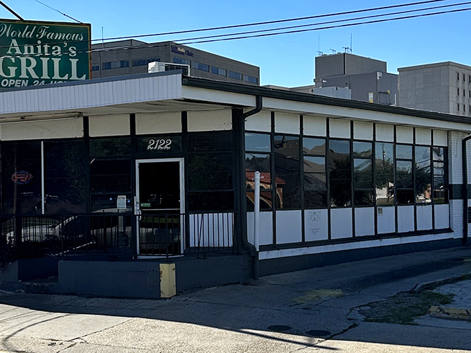The iconic green sign promises "World Famous" fare and 24-hour service&mdash;a beacon of hope for hungry souls at any hour of the day or night.