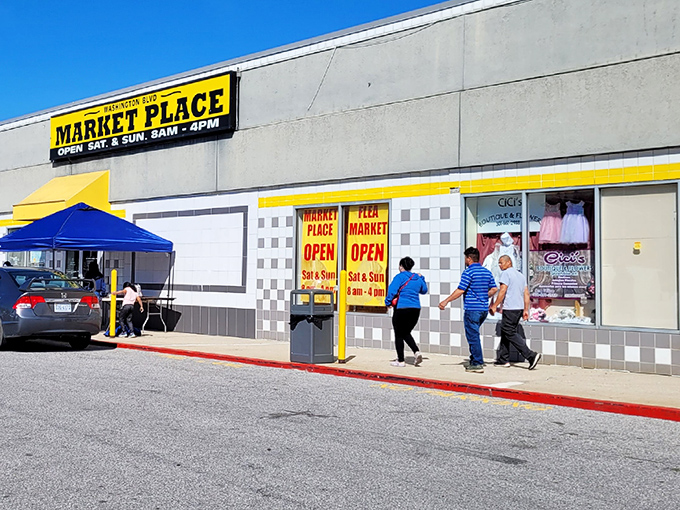 The unassuming yellow-trimmed exterior of Washington Boulevard Marketplace hides a treasure trove within.