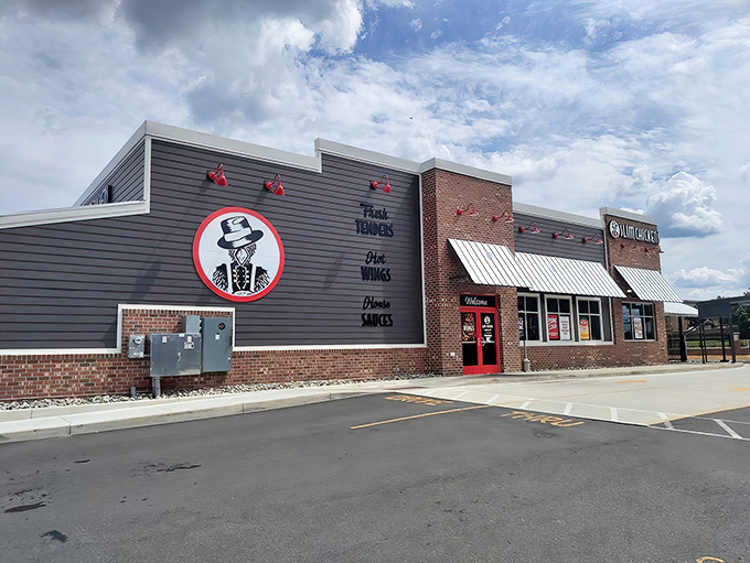 Slim Chickens' brick facade stands proudly against the Maryland sky, like a beacon calling all fried chicken enthusiasts to make their pilgrimage.