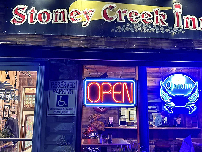 When the neon crab glows blue against the night sky, you know you're in for a genuine Maryland seafood experience, not some tourist trap imitation.