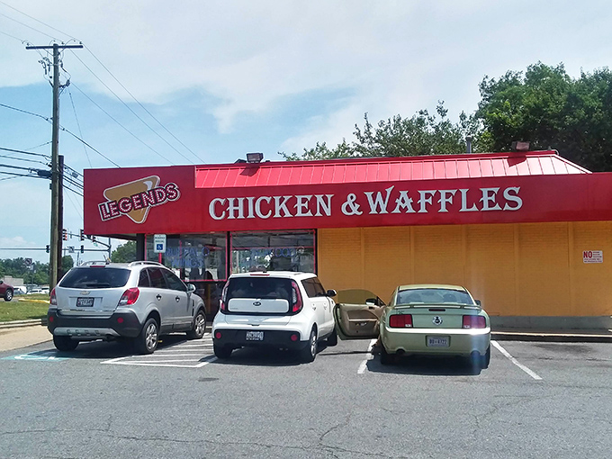The bright red awning of Legends isn't just a color choice &ndash; it's a beacon calling hungry souls to the promised land of perfectly fried chicken.