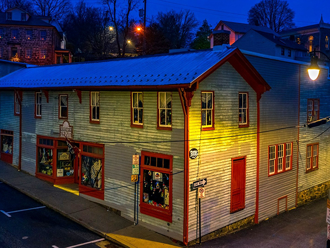 The weathered green clapboard with bright red trim makes the Antique Depot stand out like a vintage postcard come to life in Ellicott City.