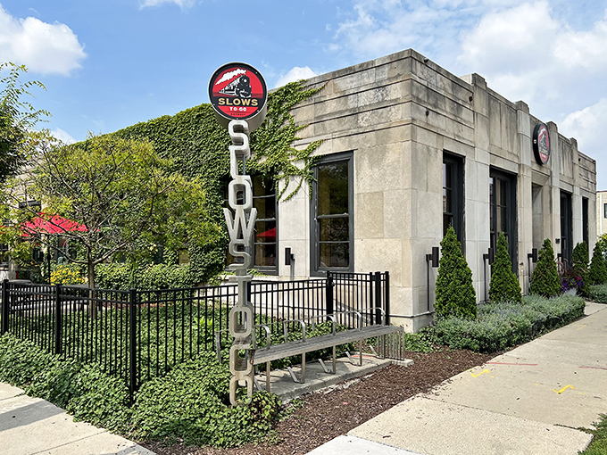 The concrete fortress of flavor! Slows To Go's iconic exterior in Detroit's Midtown neighborhood stands as a beacon for barbecue pilgrims.