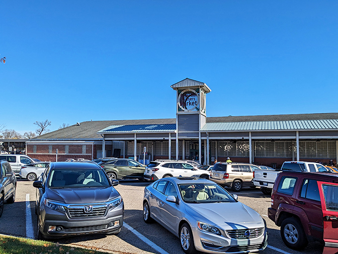 The iconic clock tower stands sentinel over a parking lot full of cars belonging to treasure hunters who know where the real gold is found.