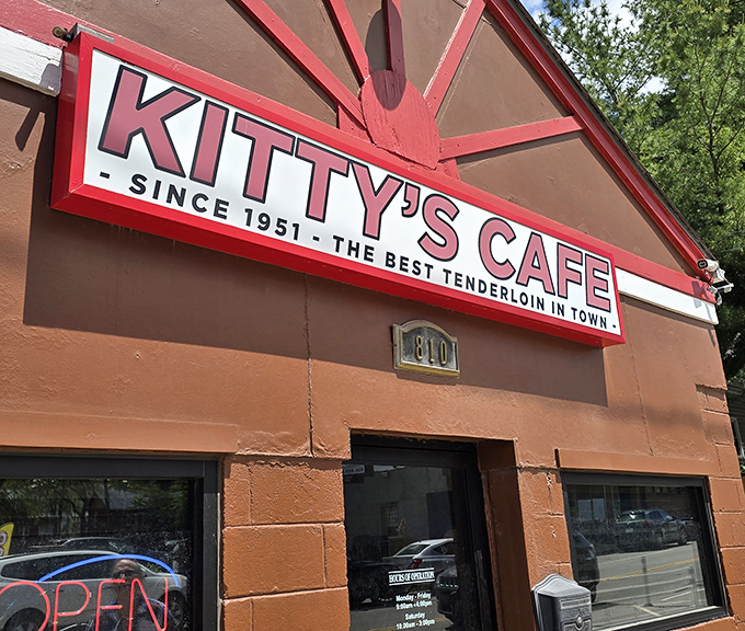 Some treasures don't need fancy packaging. Kitty's unassuming exterior conceals what might be the Midwest's most perfectly executed pork tenderloin sandwich.