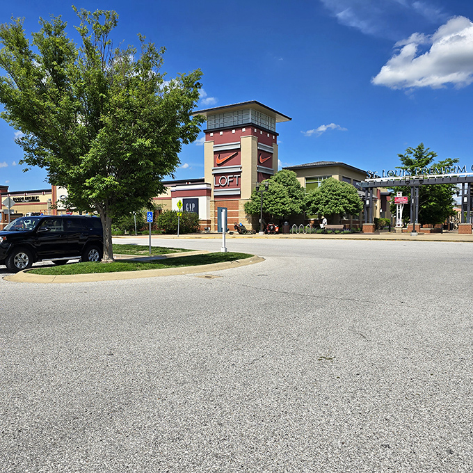 The grand entrance to St. Louis Premium Outlets stands like a retail oasis in Chesterfield, where bargain hunters begin their quest for designer treasures.