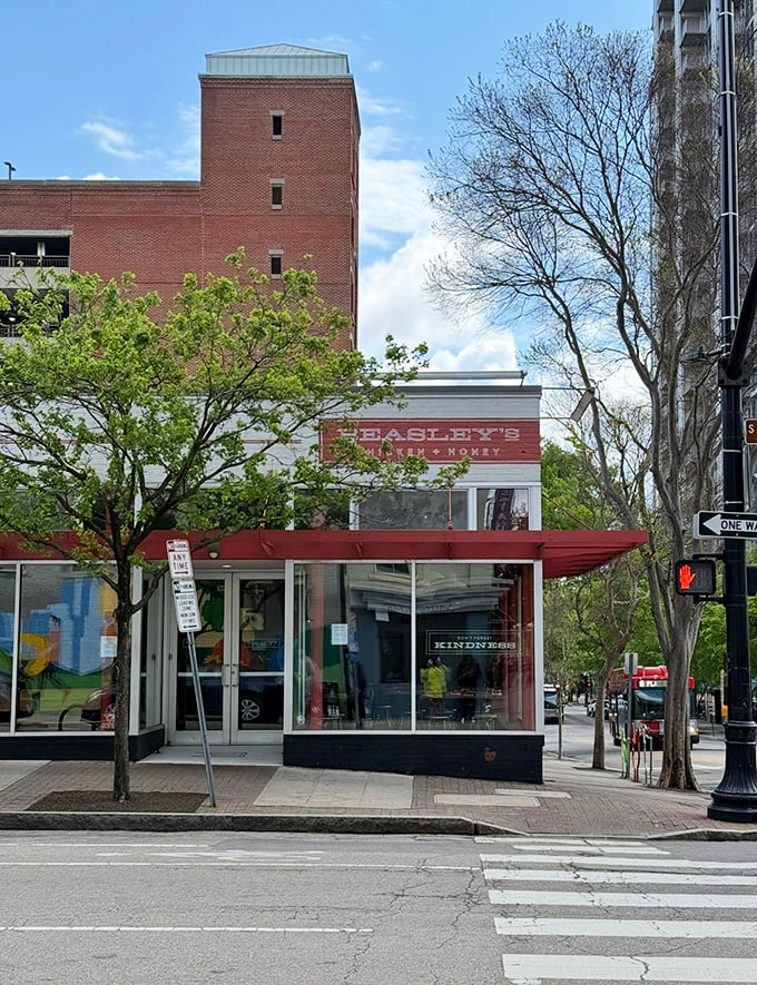 Downtown Raleigh's worst-kept secret announces itself with understated confidence. That red awning promises delicious things await inside.