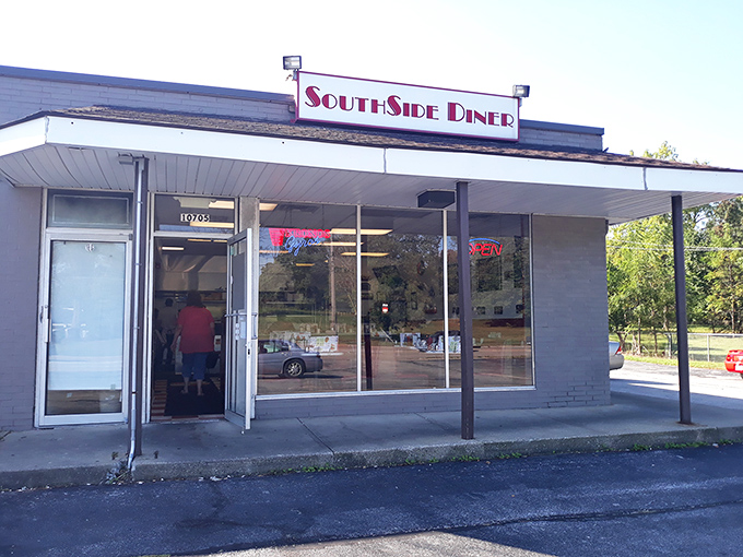 The unassuming exterior of Southside Diner stands like a beacon of breakfast hope against the Ohio sky, promising comfort food treasures within.