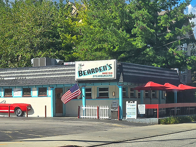 The turquoise-trimmed time machine of Rocky River beckons with its vintage sign and American flag &ndash; a burger sanctuary that's stood its ground while the world changed around it.