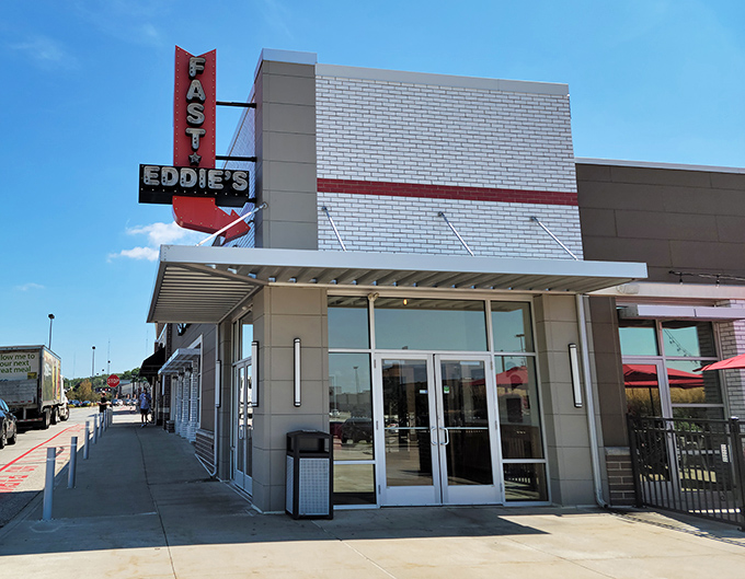 The retro-modern signage beckons like a lighthouse for the burger-obsessed. Fast Eddie's exterior promises what the interior delivers&mdash;comfort with contemporary flair.