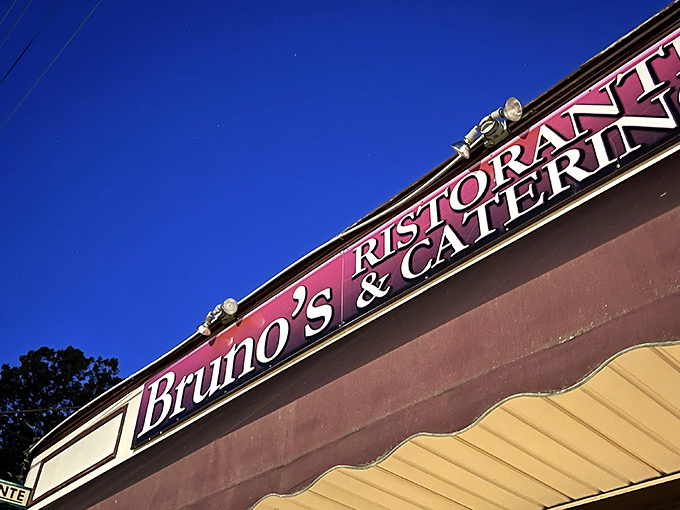The iconic sign glows against the Cleveland sky, a beacon for hungry souls seeking authentic Italian comfort.