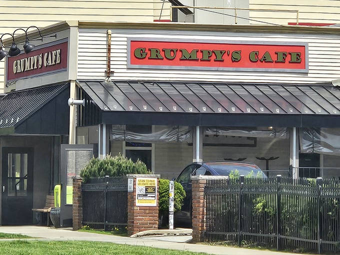 The iconic red and black sign of Grumpy's Cafe stands out against Cleveland's skyline like a beacon for breakfast enthusiasts everywhere.