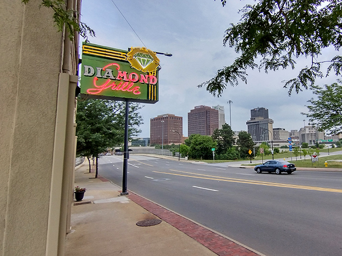 The iconic Diamond Grille sign glows like a beacon against Akron's skyline, promising carnivorous delights within its unassuming walls.