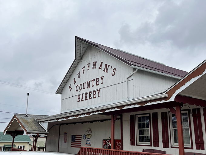 The white barn-style exterior of Kauffman's Country Bakery stands as a beacon of baked brilliance in Millersburg, promising sweet treasures within. Open seven days&mdash;because dessert emergencies don't take weekends off.