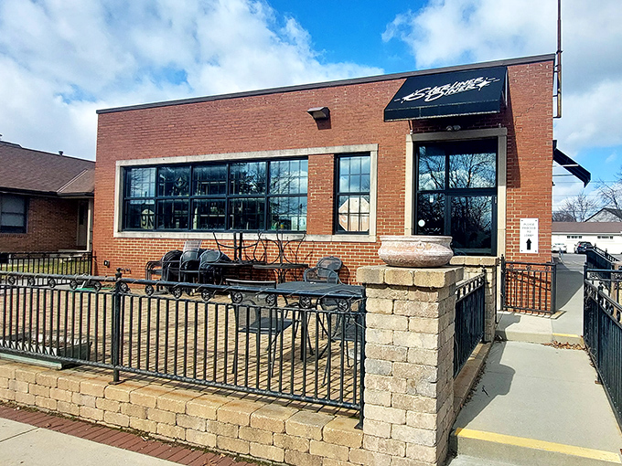 The unassuming brick exterior of Starliner Diner hides a universe of flavor within. Like all great culinary adventures, this one begins with a humble entrance.