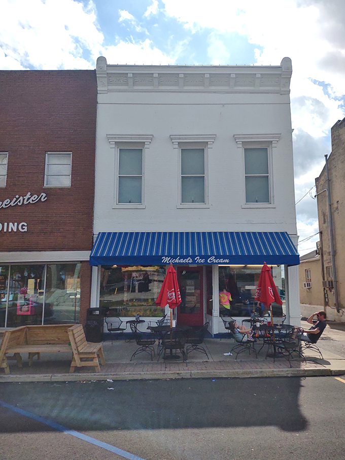 That iconic blue awning and those cherry-red benches aren't just street decor—they're a beacon of sweet salvation on Jackson's Main Street.