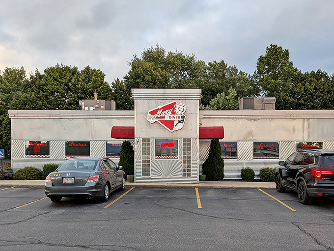 The classic white exterior with red trim announces you've arrived at comfort food paradise. Mary's Diner stands ready to transport you back in time.