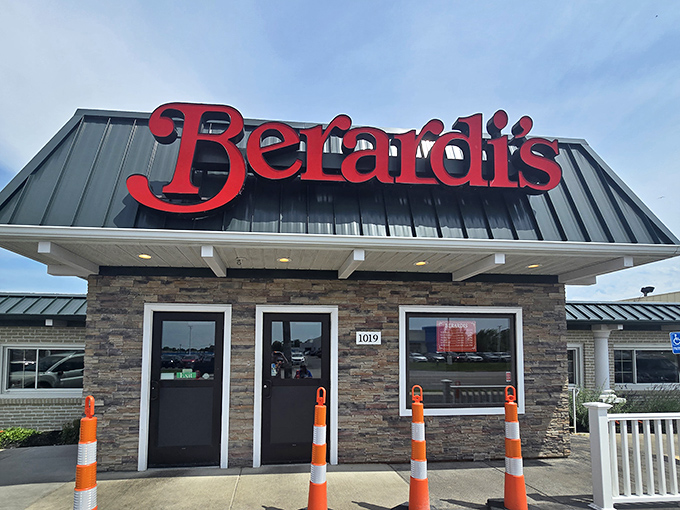 The bright red Berardi&rsquo;s sign shines against stone and steel, pointing the way to breakfast comfort food bliss.