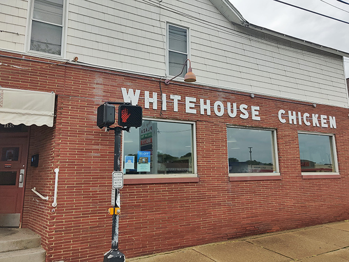 The unassuming brick facade of White House Chicken stands as a beacon to fried chicken pilgrims. No fancy frills needed when what's inside is this legendary.