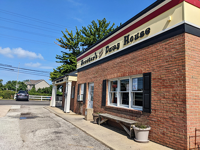 The unassuming brick exterior of Scooter's Dawg House proves once again that culinary treasures often hide in plain sight on ordinary streets.