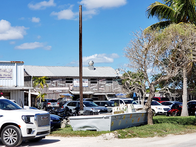 The weathered wooden exterior of City Seafood speaks volumes: authentic Florida awaits inside this unassuming Everglades City treasure.