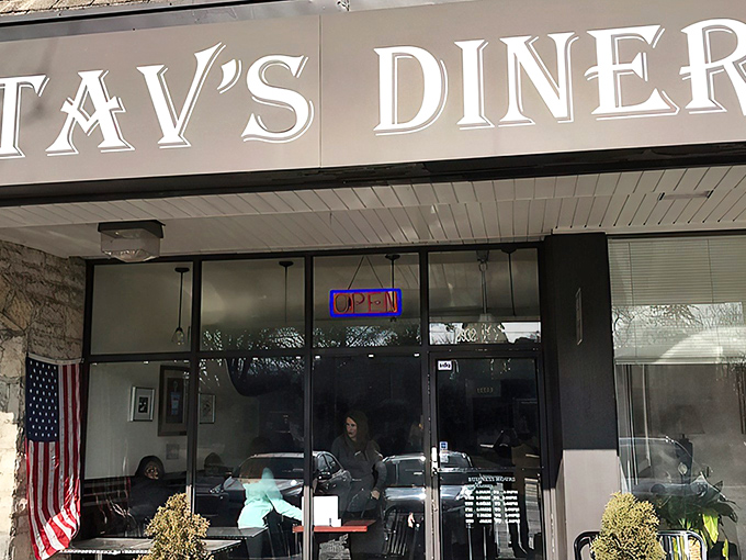 The welcoming storefront of Stav's Diner beckons with its classic signage and cozy outdoor seating&mdash;a Columbus breakfast sanctuary hiding in plain sight.