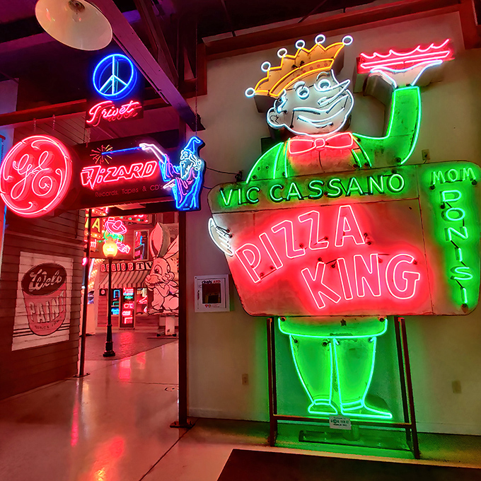 The ultimate welcome committee! A giant fiberglass "muffler man" holds court outside the American Sign Museum, promising vintage delights inside.