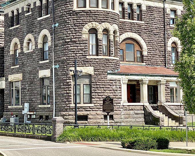 The imposing sandstone facade of the Licking County Historic Jail stands as a formidable reminder of 19th-century justice, its Romanesque Revival architecture both beautiful and intimidating.