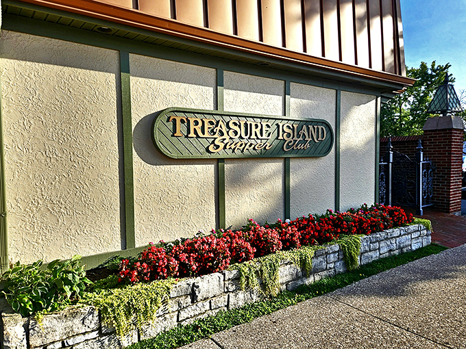 The iconic Treasure Island Supper Club sign welcomes hungry pilgrims to this Moraine landmark where time stands deliciously still.