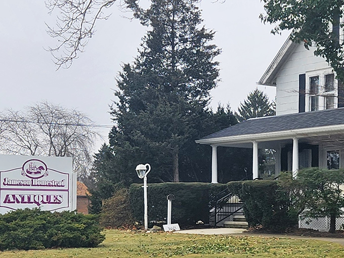 The classic white farmhouse exterior of Jameson Homestead Antiques invites you in like a warm hug from the past. History never looked so homey!