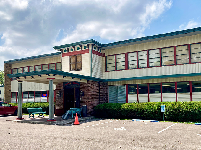 The Grand Antique Mall's distinctive mid-century architecture stands like a sentinel guarding treasures from bygone eras. That teal trim isn't just decorative&mdash;it's a portal warning.