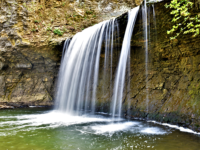 Nature's perfect curtain call &ndash; sheets of water cascade over ancient limestone, creating a mesmerizing display that seems choreographed just for you.