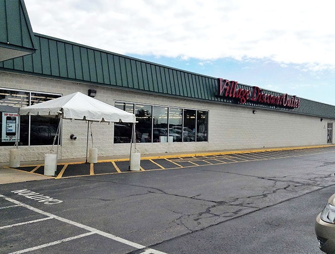 The unassuming exterior of Village Discount Outlet in Akron hides a treasure trove within. Like a Vegas casino, what happens inside stays in your cart!
