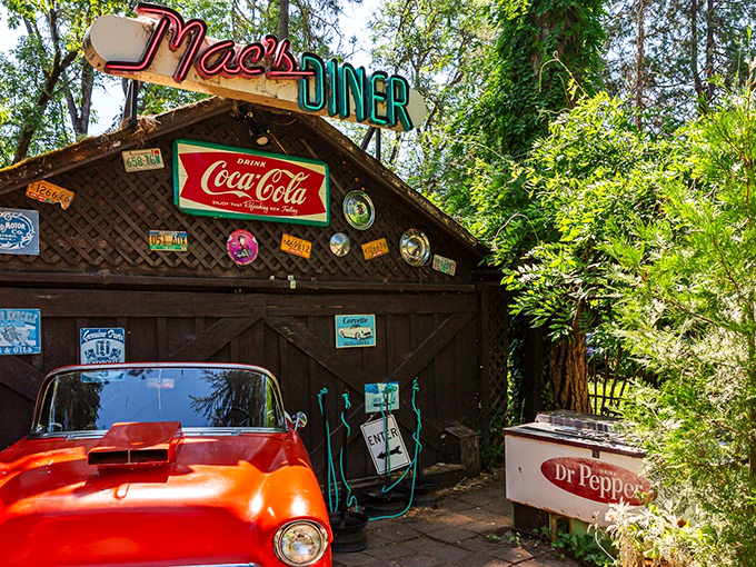 Nostalgia comes standard at Mac's, where vintage Coca-Cola signs and classic car memorabilia create the perfect backdrop for comfort food indulgence.