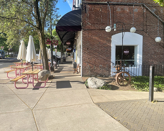 The sidewalk view of Mix Bakeshop invites you in like an old friend, its brick exterior and pink tables promising sweet refuge from everyday life.