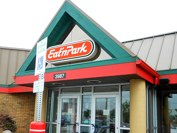The iconic green triangular roof and red trim of Eat'n Park stands as a beacon of comfort food in Monroeville, welcoming hungry Pennsylvanians like an old friend.