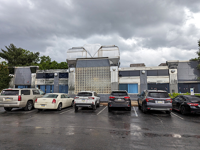 The gleaming silver exterior of Springfield Diner stands like a time capsule with modern flair, promising culinary treasures within its chrome-trimmed walls.