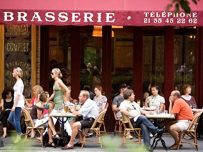 The iconic red awnings and woven bistro chairs of Parc's exterior transport you to Paris faster than any airplane could.