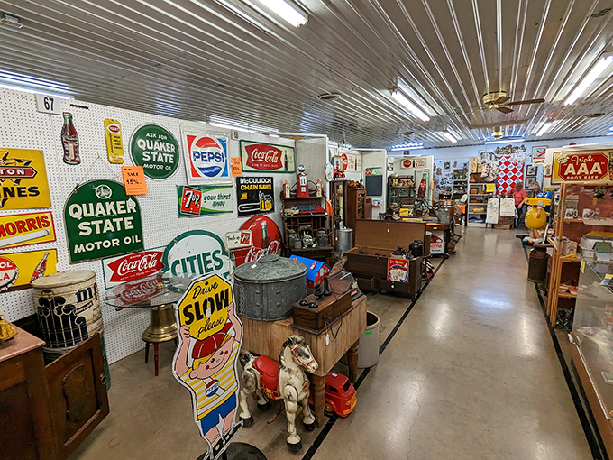 Nostalgia hangs on every pegboard hook. These vintage signs transport you to an era when Quaker State kept Pennsylvania motors humming and Coca-Cola cost a nickel.